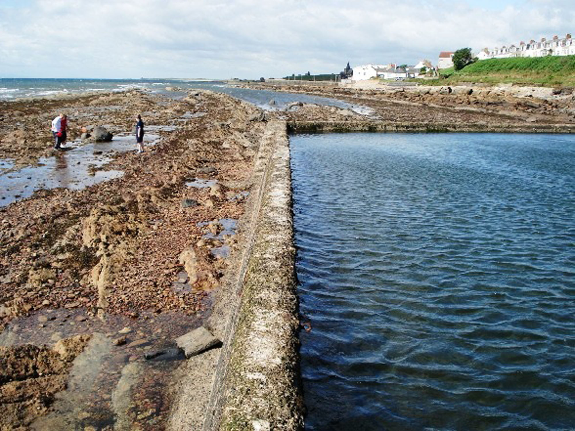 Raised beach – the houses are built upon it – UK Fossil Collecting