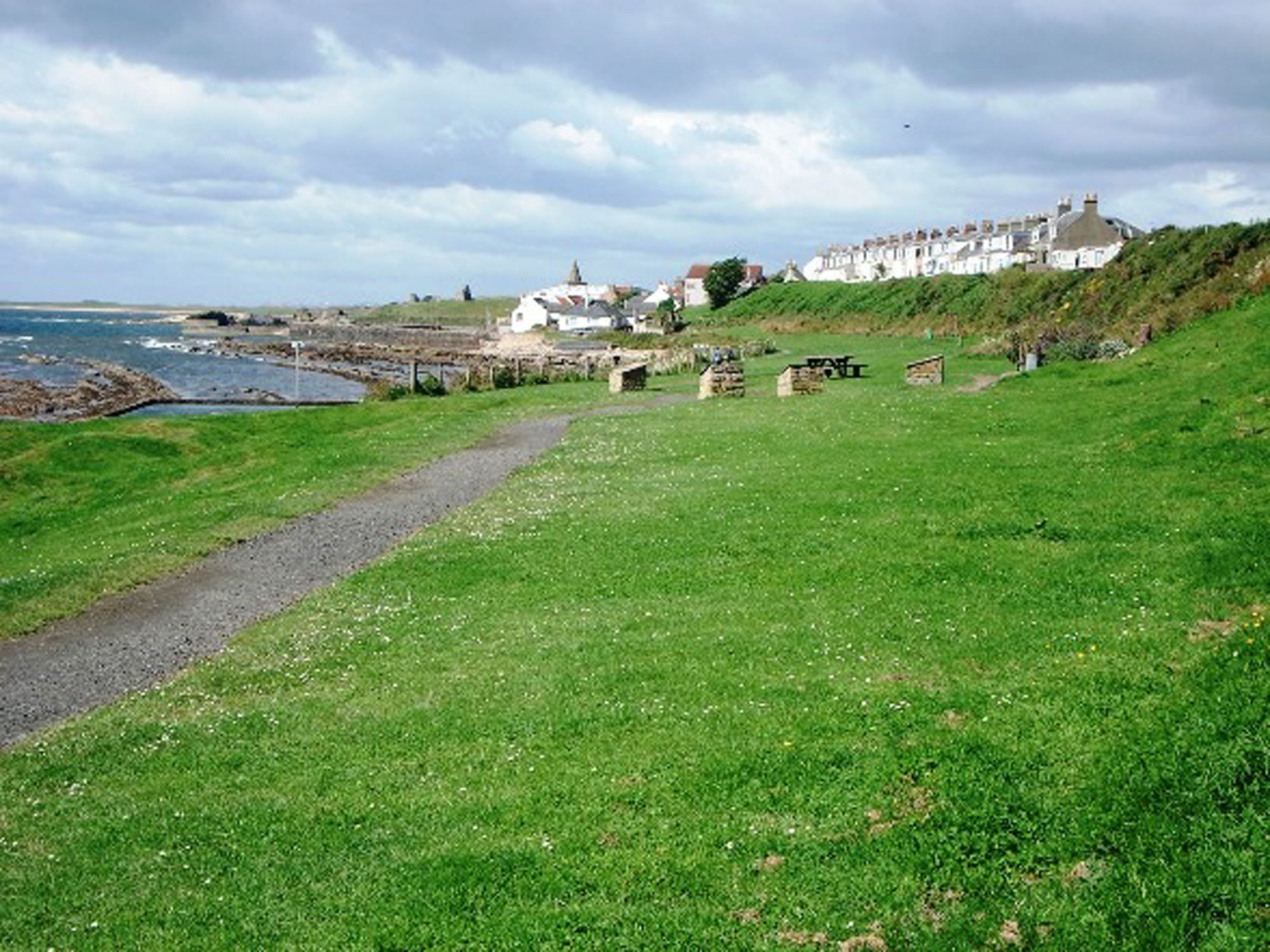 Raised beach – the houses are built upon it – UK Fossil Collecting